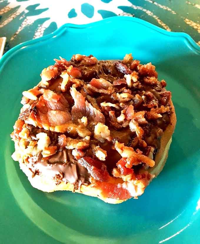 This isn't just bacon on a donut &ndash; it's a harmonious marriage of sweet and savory that makes your taste buds feel like they've won the lottery.