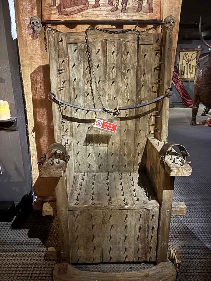 The spike-covered chair looks uncomfortable because it absolutely was, designed to inflict maximum pain while keeping victims conscious for interrogation.