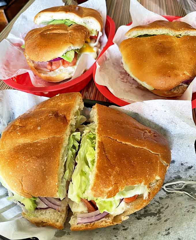 A perfect breakfast trifecta: golden hash browns, fluffy pancakes, and fresh orange juice &ndash; simple perfection on a plate.