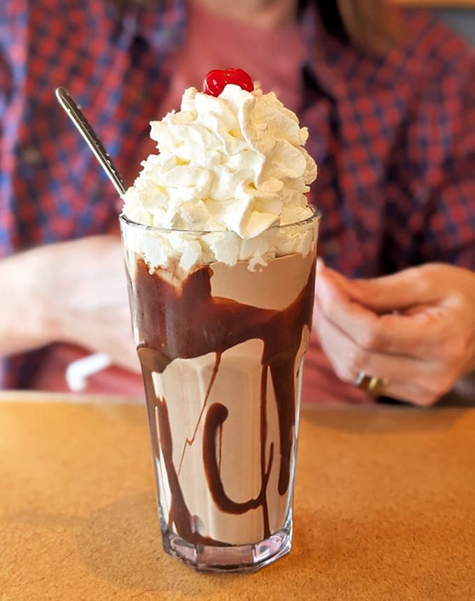 Milkshake: This isn't just a milkshake &ndash; it's a tower of creamy indulgence topped with enough whipped cream to qualify as its own food group.