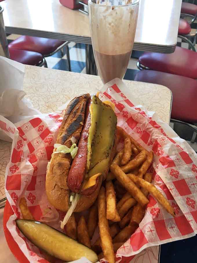 Behold the hot dog that launched a thousand road trips, perfectly grilled and ready for glory.