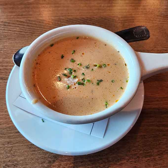 Lobster bisque so silky and rich, it makes you understand why people write poetry about food and flavors.
