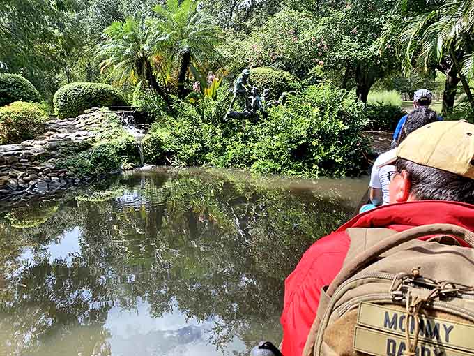 The miniature train winds through lush Florida landscapes, offering riders a unique perspective of Largo Central Park's serene ponds and greenery.