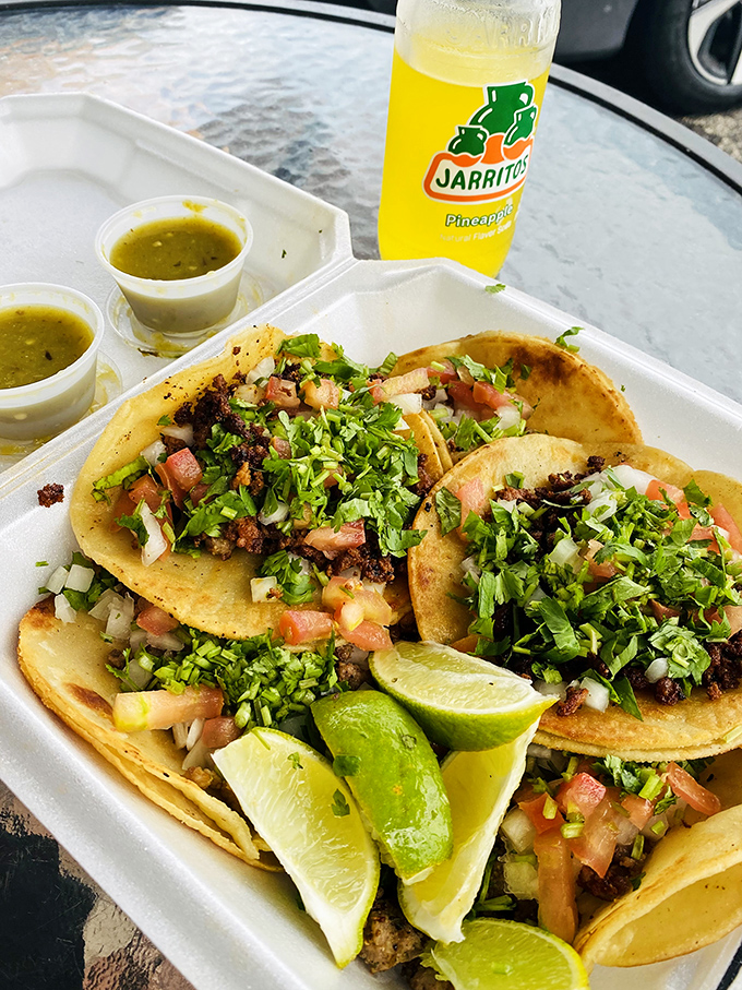 Perfectly charred pork nestled in double corn tortillas, crowned with cilantro and onion &ndash; taco perfection that needs no embellishment.