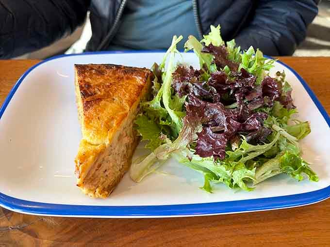 Golden quiche paired with fresh greens proves that simple combinations often deliver the most satisfying results on your plate.