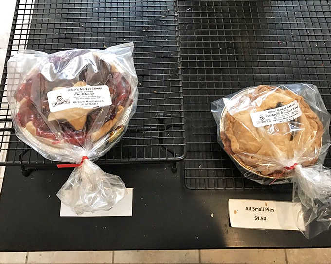 A quartet of pie perfection awaits lucky diners. Four slices, four flavor journeys, zero regrets about elastic waistbands.