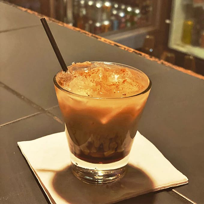 The Pumpkin Spice White Russian proves that seasonal flavors and classic cocktails can coexist peacefully in one delicious glass.