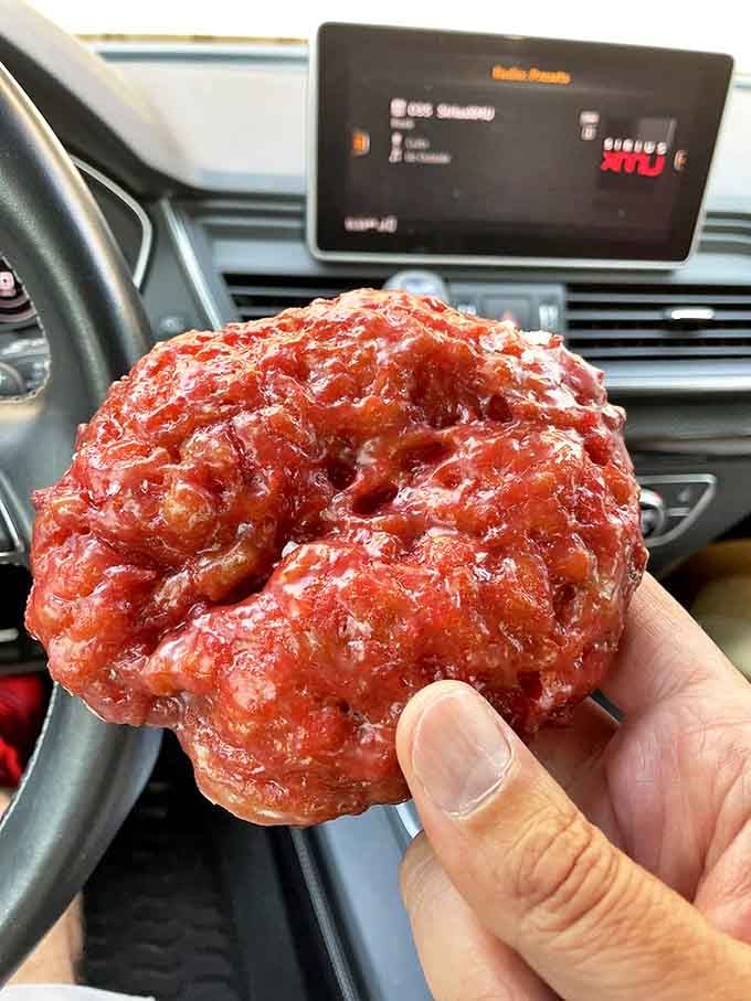 This raspberry fritter isn't just a donut&mdash;it's a ruby-hued flavor explosion. The perfect balance of tart and sweet in every gloriously irregular bite.