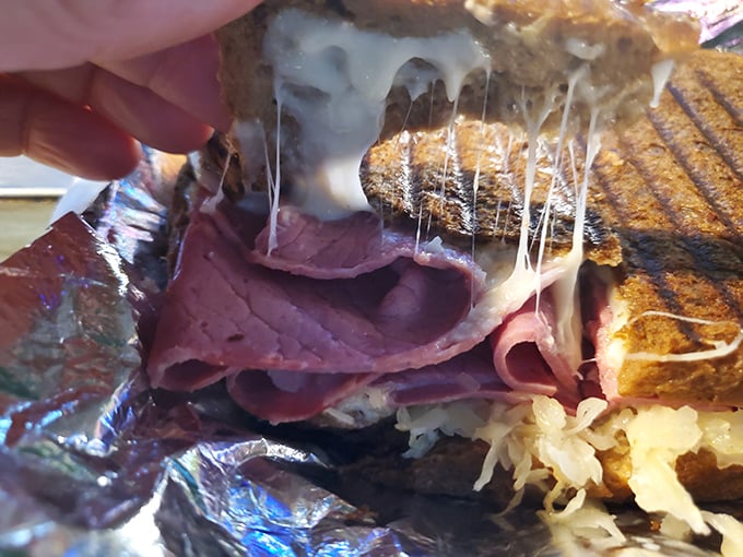 That cheese pull though! Melted Swiss stretching like it's auditioning for a food commercial &ndash; the kind that makes you involuntarily say "mmmmm."