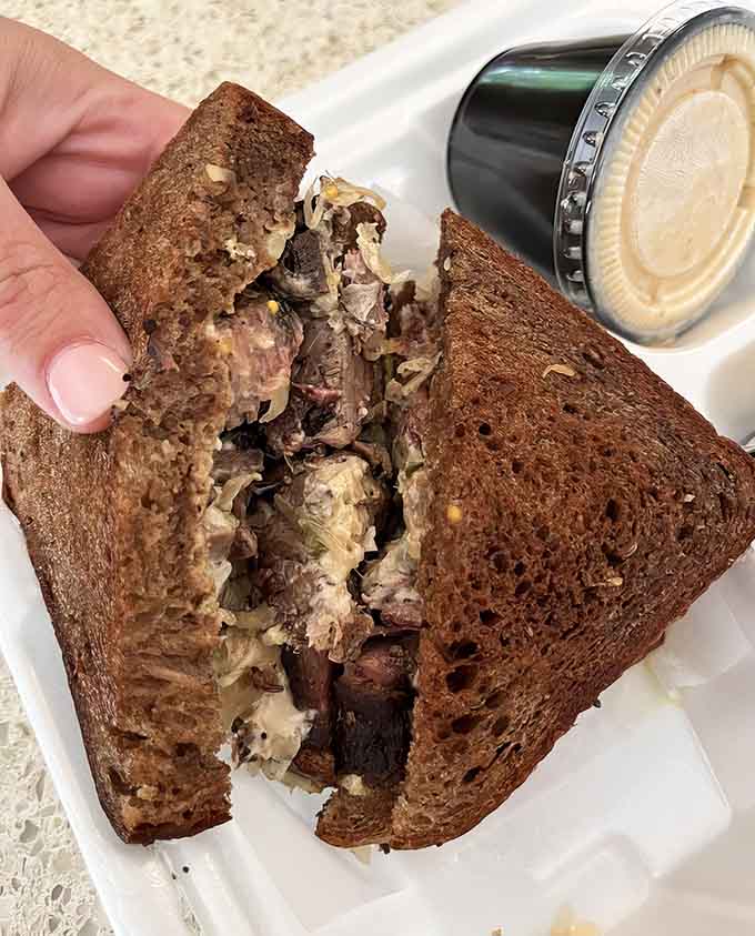 The Reuben gets a barbecue makeover with tender brisket replacing corned beef, proving that innovation and tradition can be delicious friends.