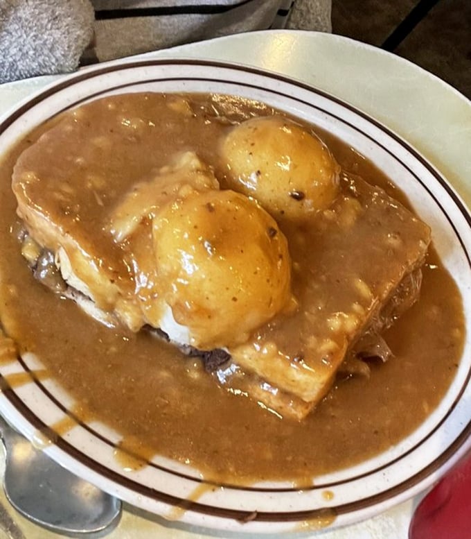 Tender slices of house-roasted beef nestled between bread that somehow contains this magnificent creation without surrendering to delicious defeat.