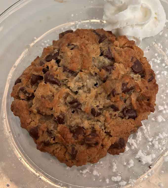 These aren't your grandmother's oatmeal cookies (unless she was a secret pastry genius) – crisp edges giving way to chewy centers of pure comfort.