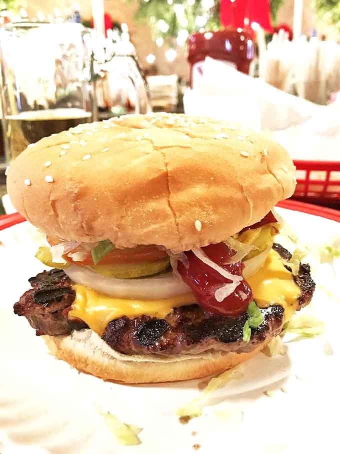 This isn't just a burger&mdash;it's a masterclass in flavor architecture. The cheese cascades down like a yellow waterfall of happiness.