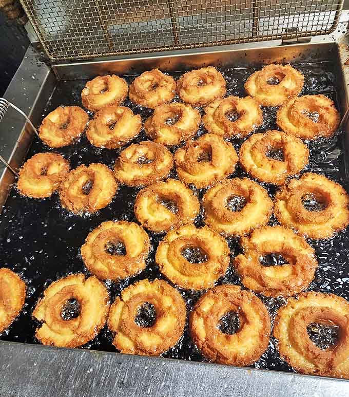 Sour cream donuts: Golden-brown perfection sizzling in hot oil – watching these beauties fry is almost as satisfying as eating them. Almost.
