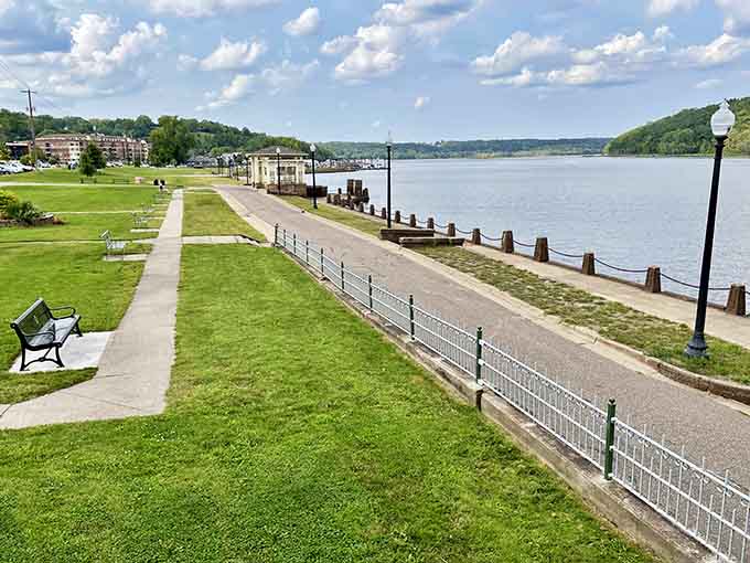 The riverfront walkway at Lowell Park invites leisurely strolls where the biggest decision you'll face is which bench to claim for river-watching.