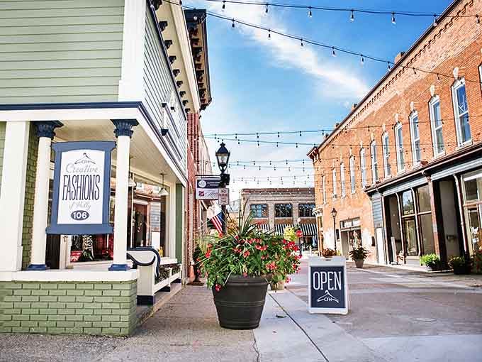 String lights create everyday magic between these historic storefronts, where shopping becomes an intimate experience rather than a transaction.