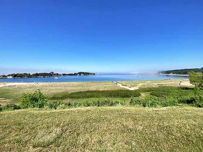 Where blue meets blue: Lake Michigan's crystal waters create a horizon line so perfect it looks Photoshopped, but it's 100% pure Michigan magic.