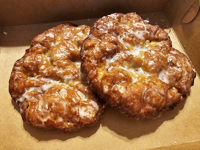 These apple fritters aren't just donuts&mdash;they're architectural marvels of fried dough, substantial enough to require both hands and zero regrets.