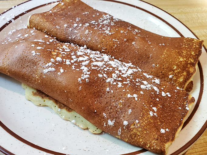 These aren't just pancakes&mdash;they're edible art! Thin, delicate Swedish pancakes dusted with powdered sugar await their perfect partner: lingonberry sauce.