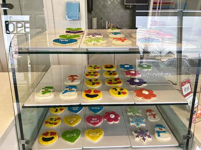 Sugar cookies transformed into edible art, each one decorated with the kind of precision that makes you almost hesitate to eat them.