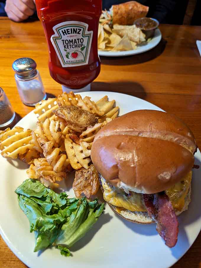 Behold the bacon cheeseburger that's launched a thousand return visits, stacked high with crispy bacon perfection.