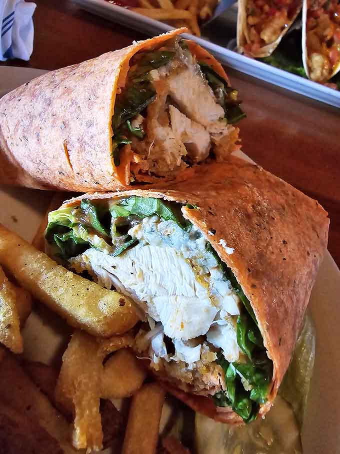 The Chicken Caesar Wrap arrives looking simple but delivers complex, perfectly balanced flavors in every bite.