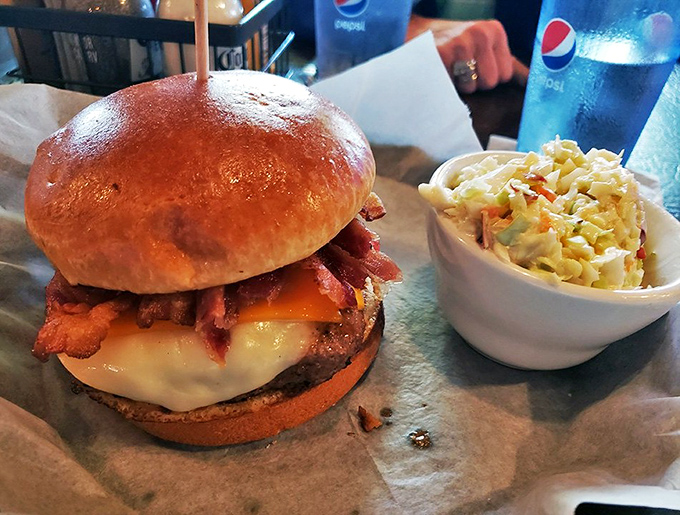 Teddy's Choice burger arrives like edible architecture – a towering masterpiece of beef, bacon, and cheese that demands to be photographed before devoured.