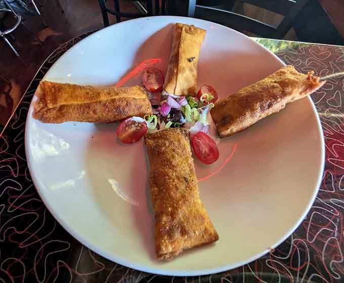 Behold the gyro rolls in all their crispy, golden glory, standing at attention like delicious little flavor towers ready for duty.