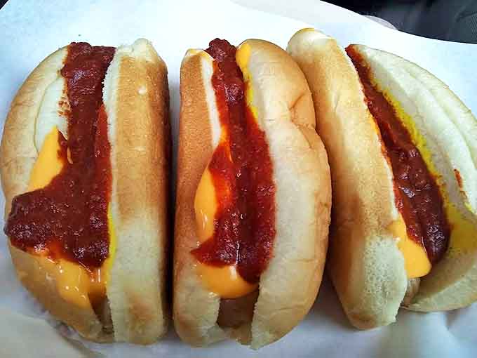 These aren't just chili dogs &ndash; they're edible time machines, transporting you back to a simpler era with each perfectly seasoned bite.