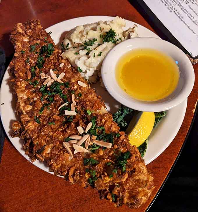 The Canadian Walleye arrives looking like it just won an award, crispy perfection meeting tender flakiness in beautiful harmony.