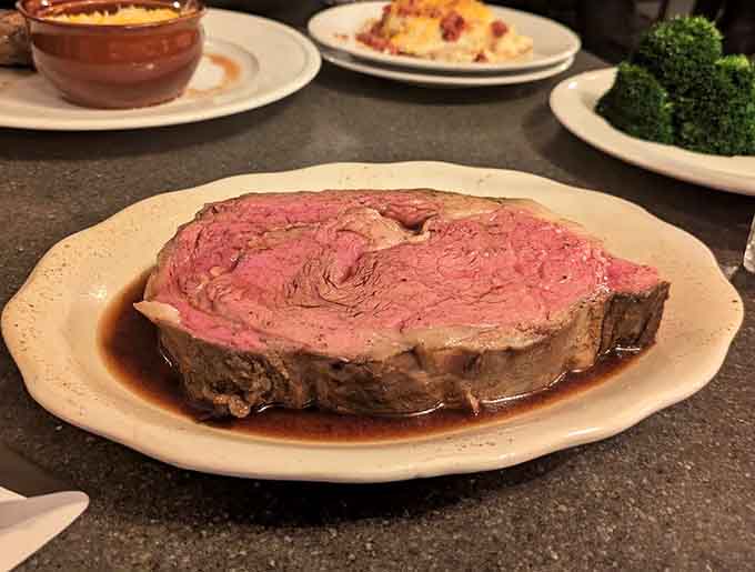 Behold the prime rib that launched a thousand road trips, perfectly pink and swimming in au jus like edible perfection.