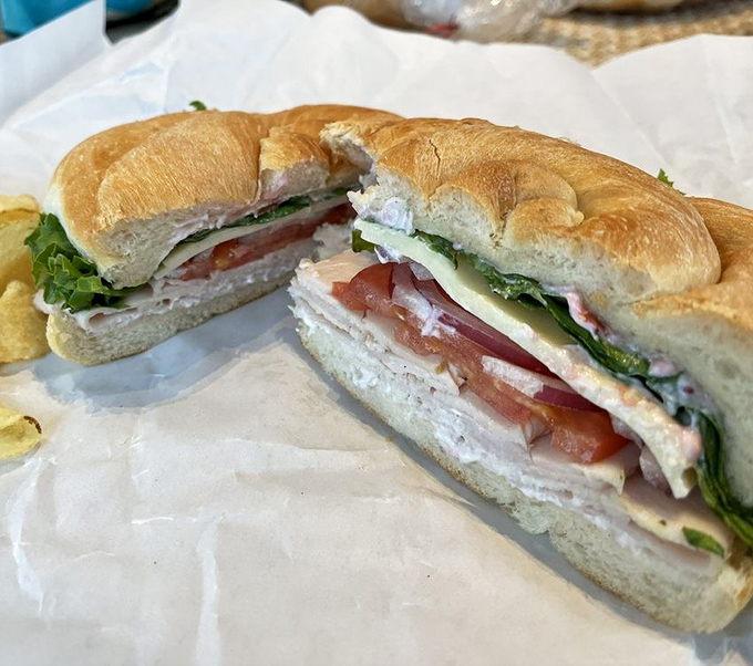 A masterpiece of simplicity: fresh ingredients layered perfectly between homemade bread &ndash; this isn't just lunch, it's edible architecture.