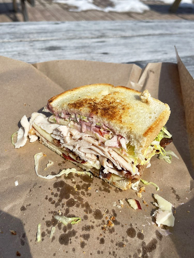 This turkey sandwich isn't just lunch, it's an event &ndash; house-roasted meat stacked high with fresh veggies spilling out.