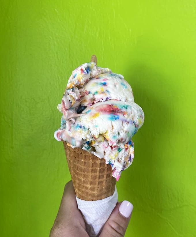 This rainbow explosion in a cone features vanilla ice cream studded with colorful sprinkles and M&Ms &ndash; childhood joy in edible form.