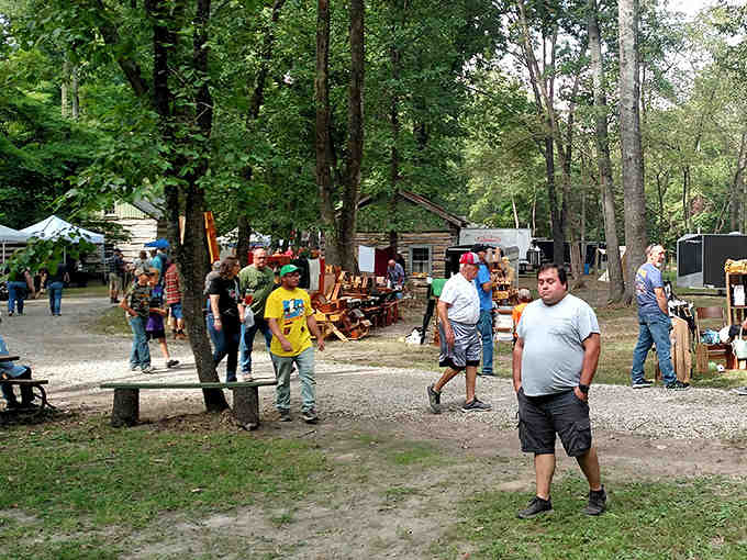Festival day brings the village to life as visitors wander between historic structures, perhaps wondering how they'd fare without Wi-Fi for a weekend.