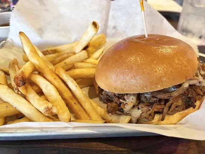 The pot roast sandwich arrives piled high with tender meat that practically melts on contact.