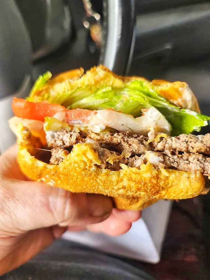 This isn't just lunch &ndash; it's edible nostalgia. A perfectly assembled burger with all the fixings represents the straightforward deliciousness that's Vince's hallmark.