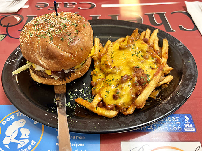 This isn't just any burger – it's a masterclass in comfort food architecture, complete with cheese-smothered fries that demand to be devoured immediately.