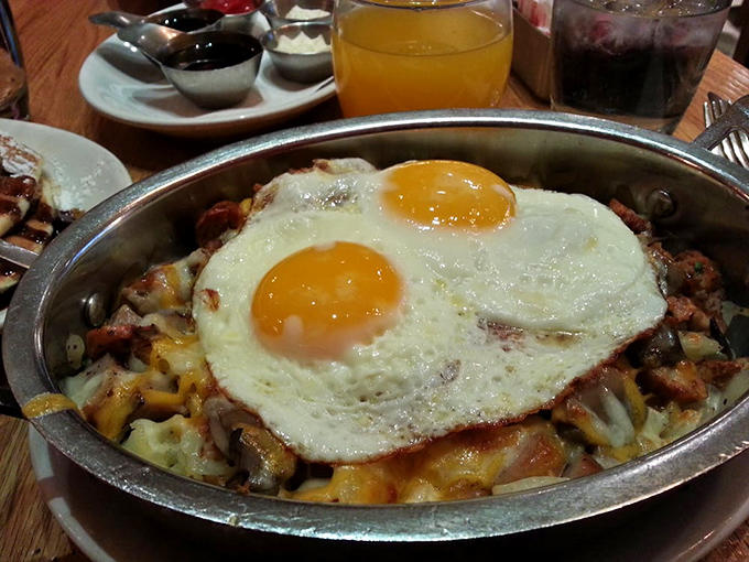 The Butcher skillet arrives sizzling with eggs, potatoes, and enough savory goodness to fuel your entire day, maybe your entire week.