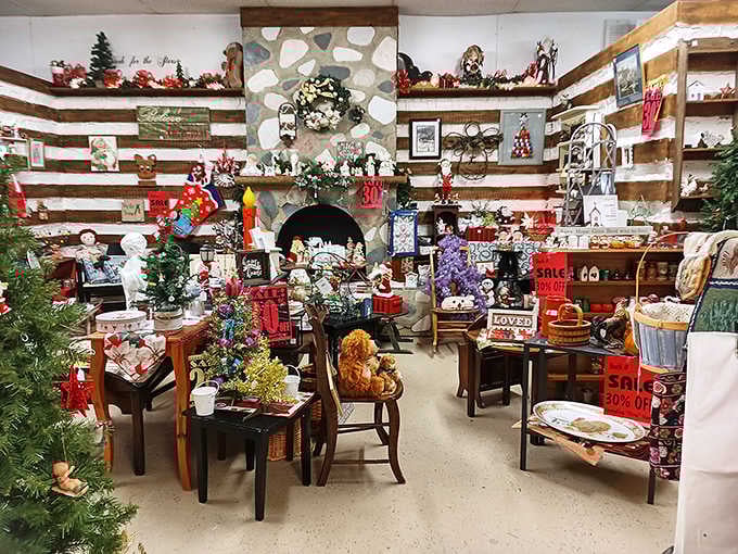 The Christmas corner maintains holiday magic year-round, with vintage decorations and festive finds nestled in a cozy log cabin setting.
