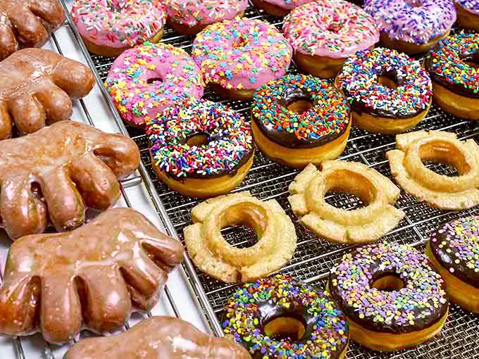 Rainbow sprinkles dance atop perfectly glazed donuts, creating an edible kaleidoscope that's as much a feast for the eyes as the taste buds.