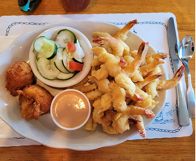 Golden-battered perfection on a plate &ndash; these aren't just fried shrimp, they're edible love letters to the sea.