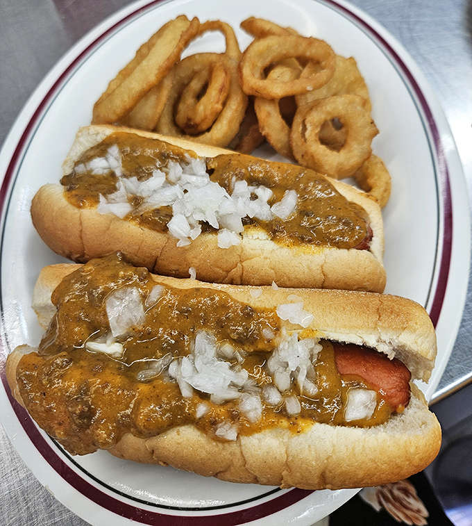 Coney dogs topped with that legendary chili, diced onions, and mustard &ndash; a Detroit-area tradition that tastes even better at 2 AM.