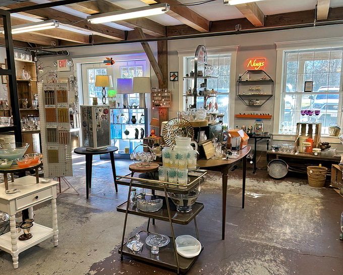 Gleaming glassware catches the light in one of the many meticulously arranged vendor spaces throughout the sprawling complex.