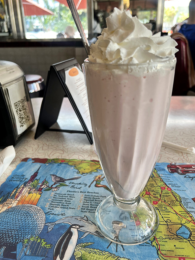 A strawberry milkshake that makes adults gasp and children plot heists. That mountain of whipped cream? Worth every calorie.