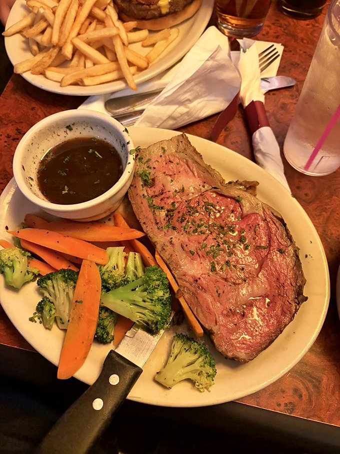 Prime rib that makes you question reality &ndash; tender, perfectly seasoned, and served with vegetables that actually received attention from the chef.