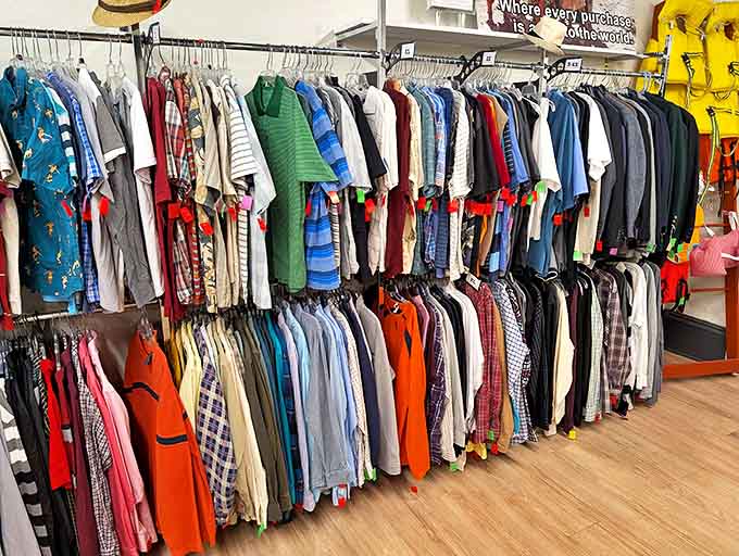 Racks of color-coordinated clothing create a rainbow of possibilities, each garment carrying whispers of its previous life and adventures.