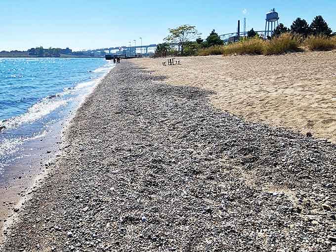 Where land meets water: The undeveloped shoreline offers a natural beach experience, with smooth stones and occasional beach glass treasures waiting to be discovered.