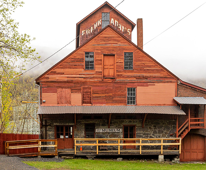 Frank Adams Grist Mill Museum preserves Vermont's agricultural heritage, its weathered wooden exterior telling stories of early industry and innovation.