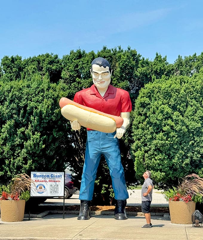 The Bunyon Giant makes even full-grown adults look like action figures, which is exactly the point of roadside advertising done right.